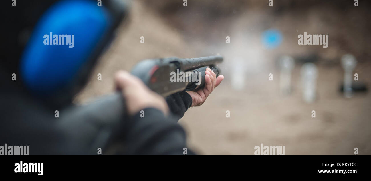 Combat shotgun shooting training. Long gun, pump gun and scattergun ...