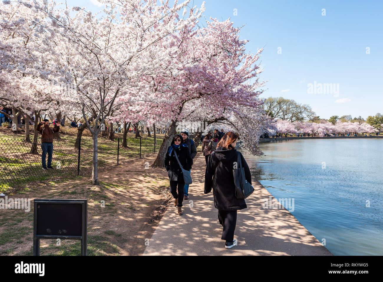 Washington DC, USA - April 5, 2018: Tourists many people walking on ...
