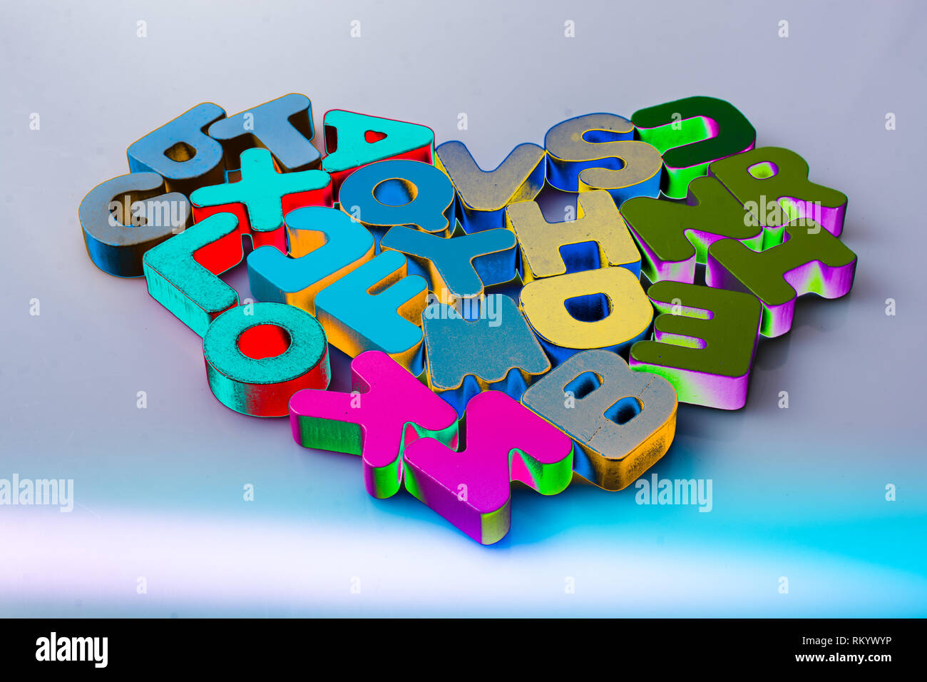 Colorful letter blocks shape heart on white background Stock Photo - Alamy