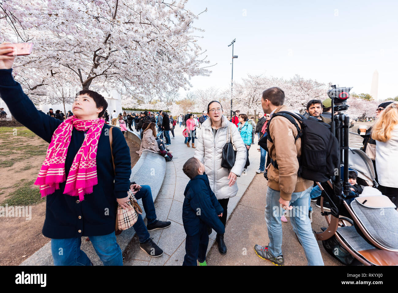 Washington DC, USA - April 5, 2018: Tourists people many crowd walking ...