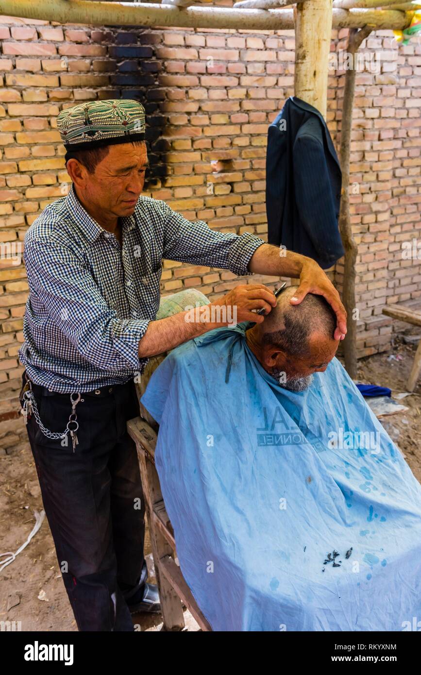Haircut On Street High Resolution Stock Photography and Images - Alamy