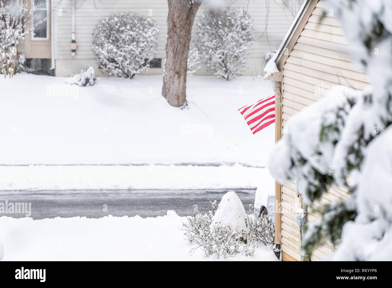 American flag in snow hi-res stock photography and images - Alamy