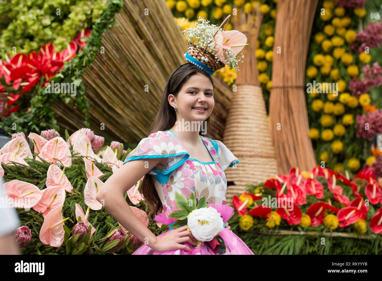 children dressed in colorful clothes at the Festa da Flor or Spring ...