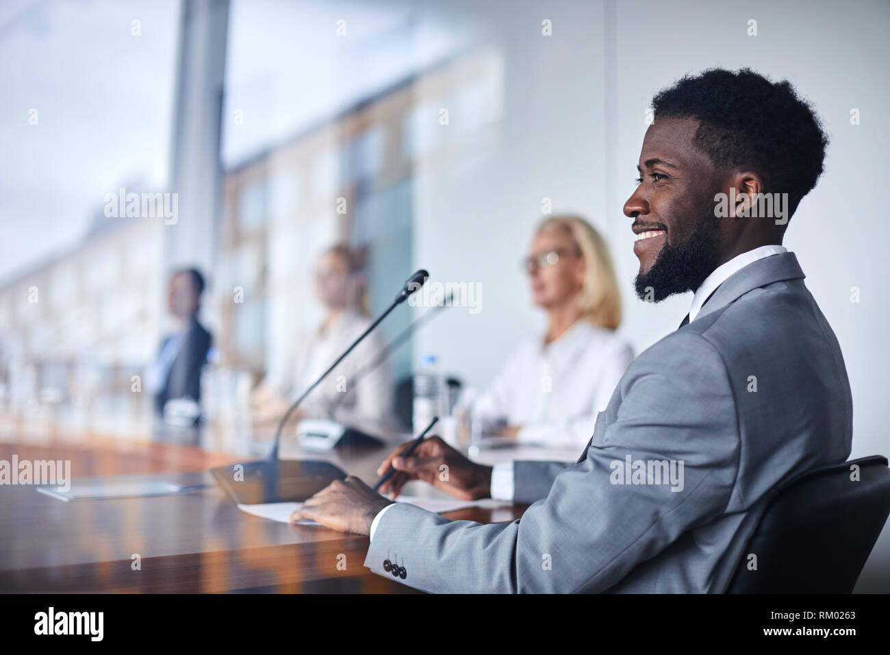 Taking part in conference Stock Photo - Alamy