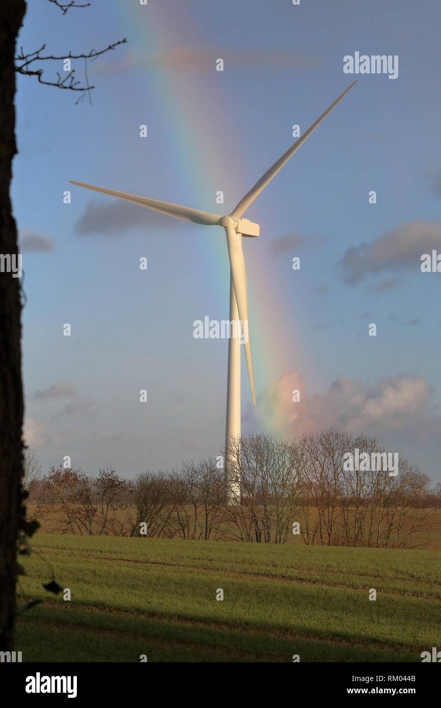 Wind turbine with a rainbow behind it Stock Photo - Alamy