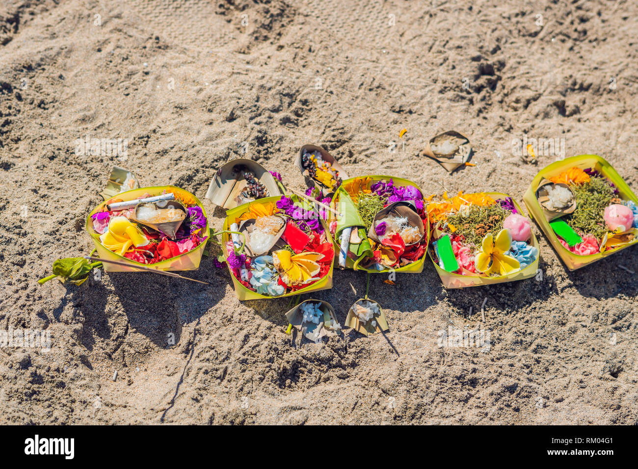 Hindu offerings and gifts to god on the beach in Bali, Indonesia Stock ...