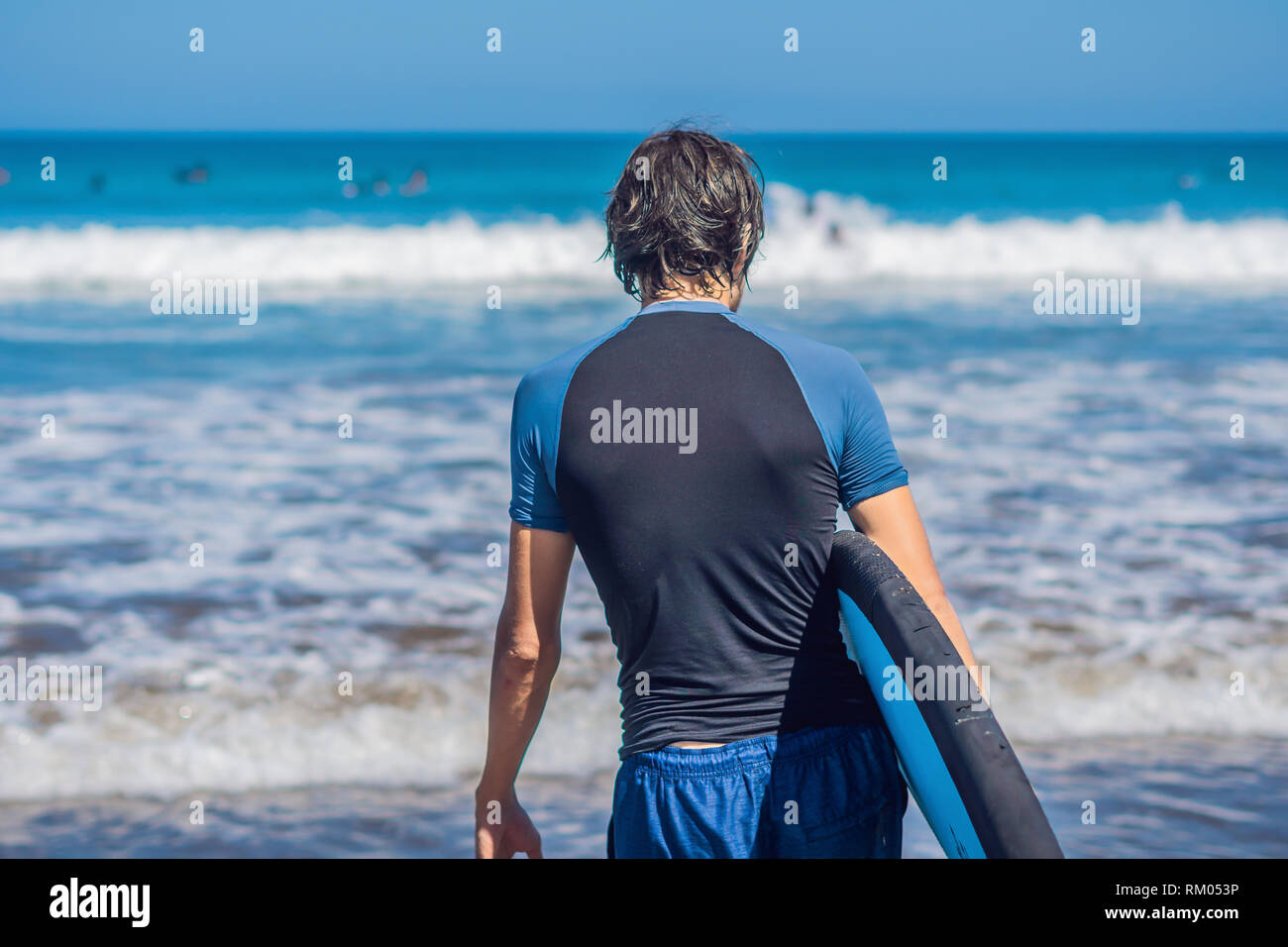 Handsome surfer posing surfboard hi-res stock photography and images ...