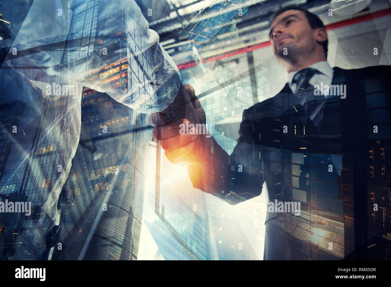 Handshaking business person in the office with network effect. concept ...