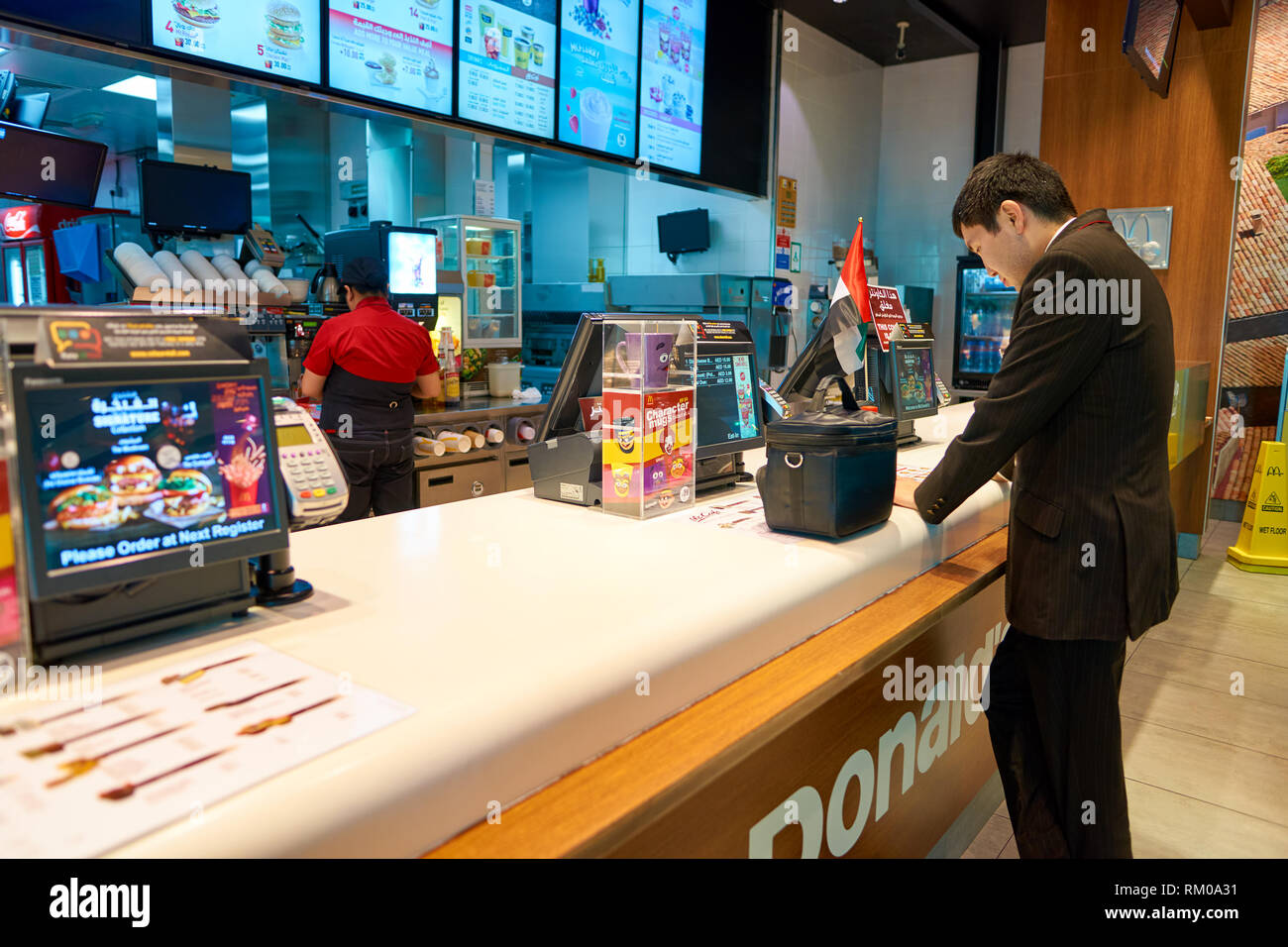DUBAI, UAE - CIRCA NOVEMBER, 2016: counter service in a McDonald's ...