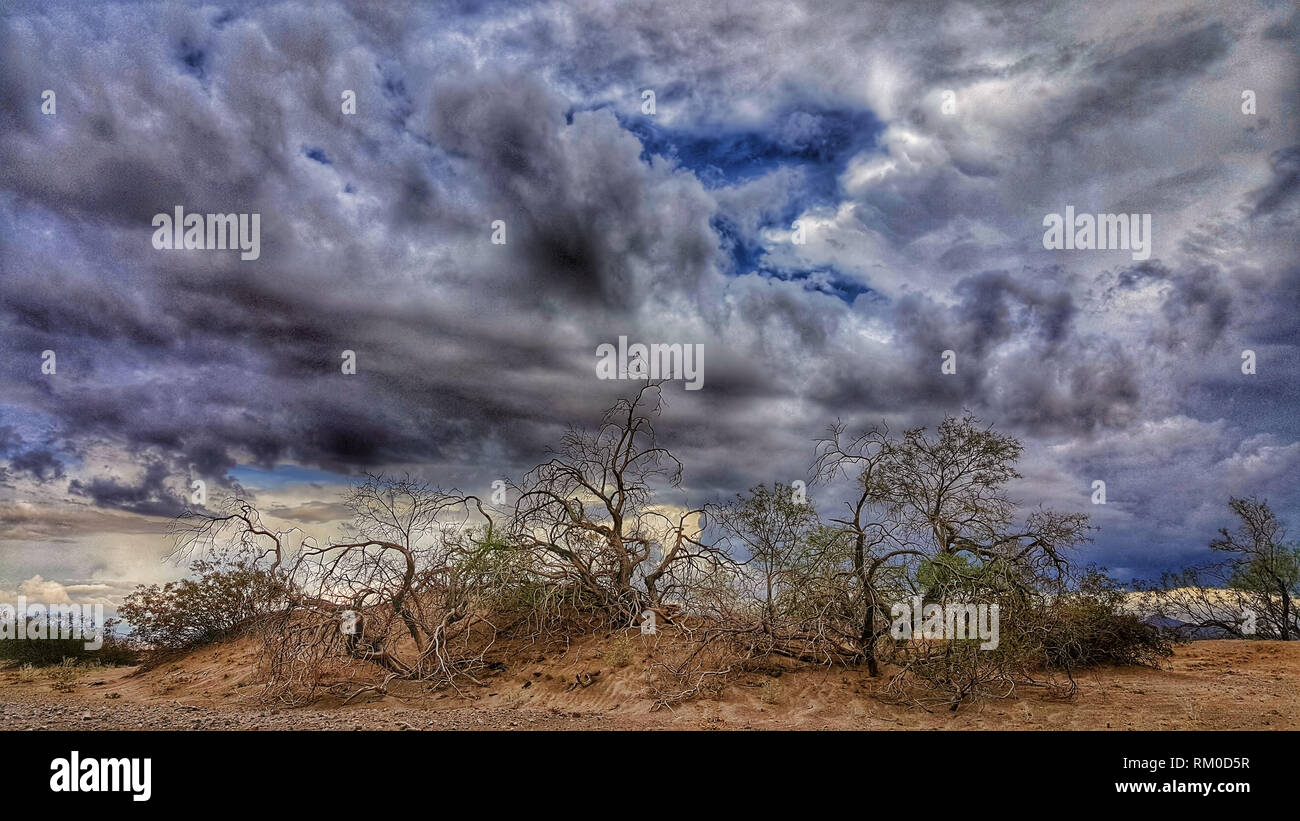 Dark skies over desert hi-res stock photography and images - Alamy