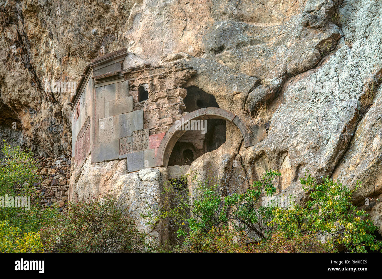 The preserved corner and arched entrance to the cave church in the rock ...