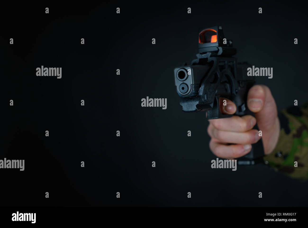 Red dot gun hi-res stock photography and images - Alamy