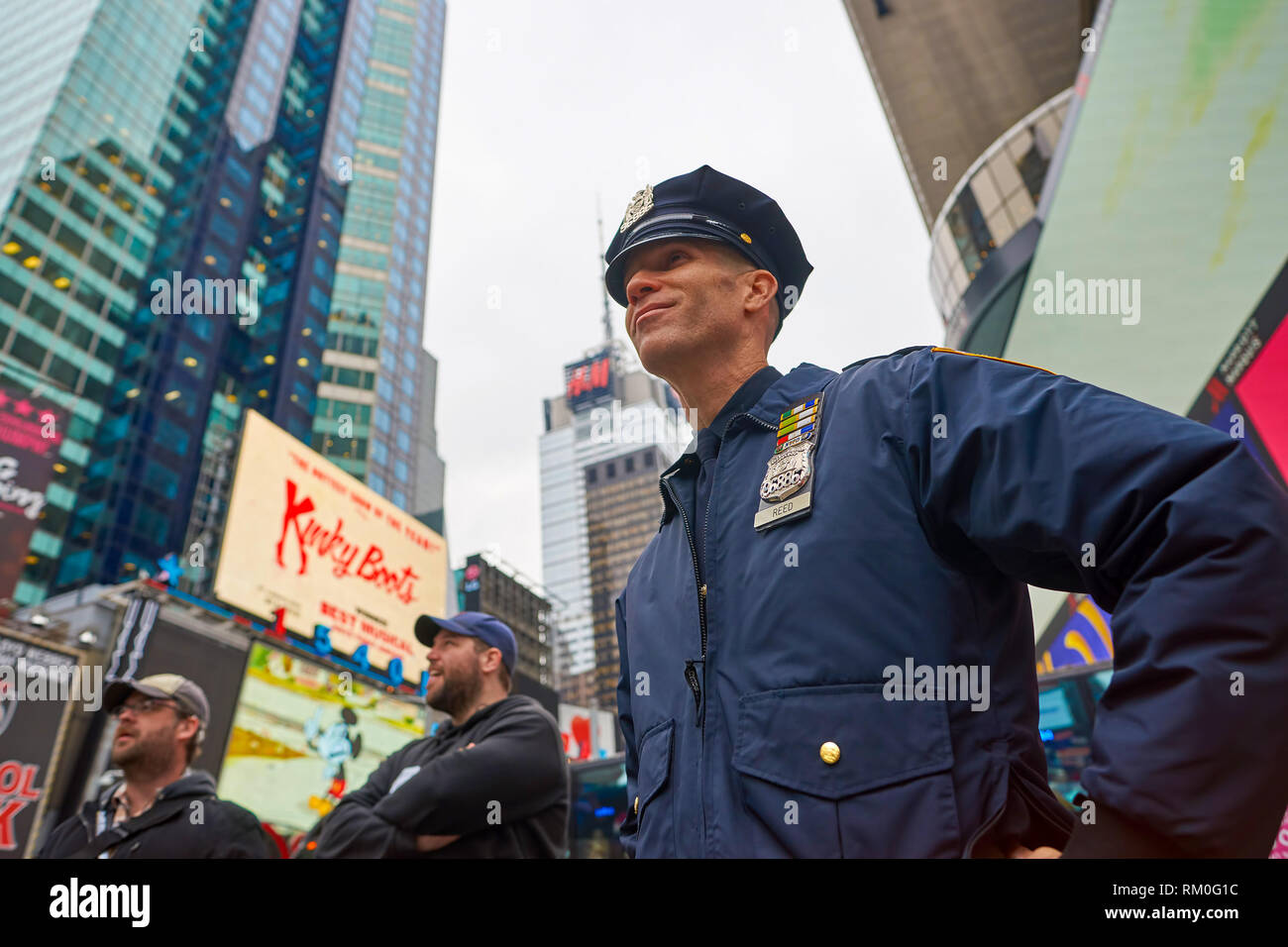 NEW YORK - CIRCA MARCH, 2016: outdoor portrait of NYPD officer at Times ...