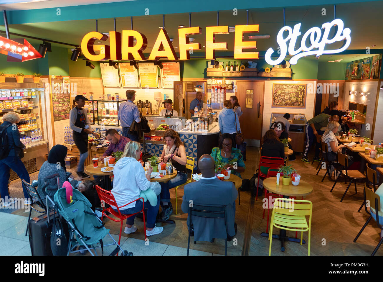 DUBAI, UAE - CIRCA NOVEMBER, 2016: Giraffe cafe in Dubai Airport. There ...