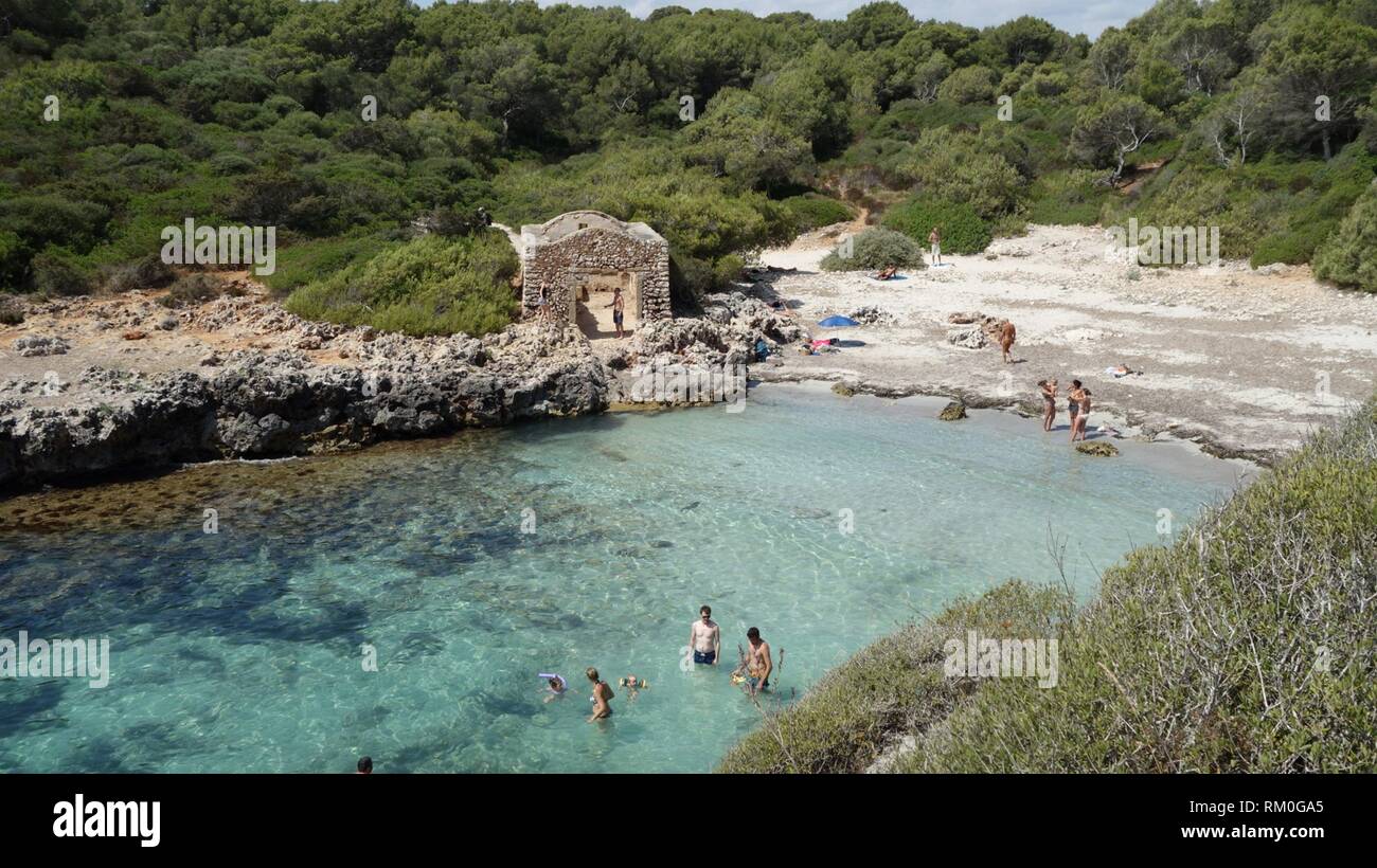 Tourists in the bay of Cala Brafi, Felanitx, Majorca island, Spain ...