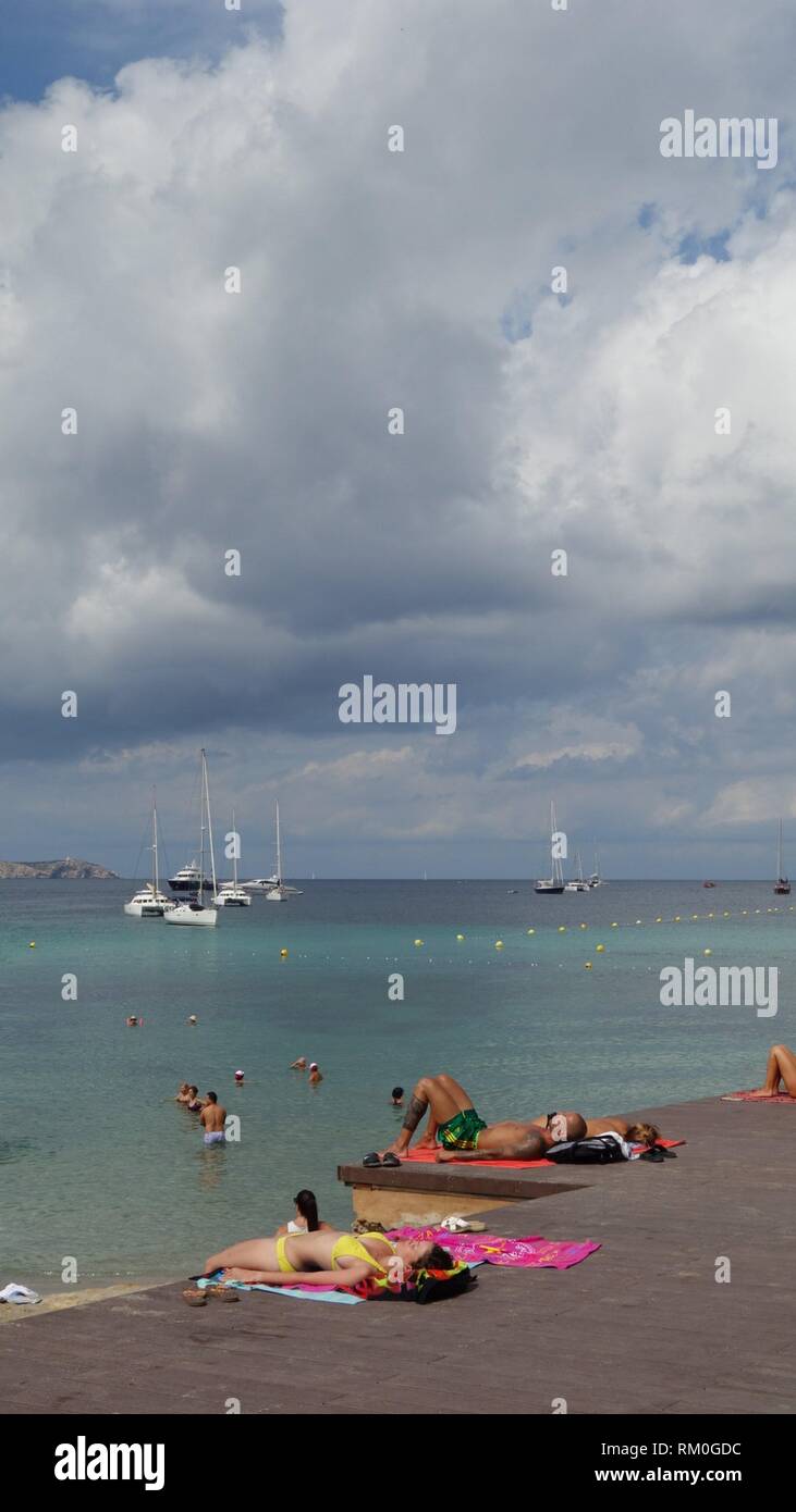 Ibiza beach sunbathing hi-res stock photography and images - Alamy