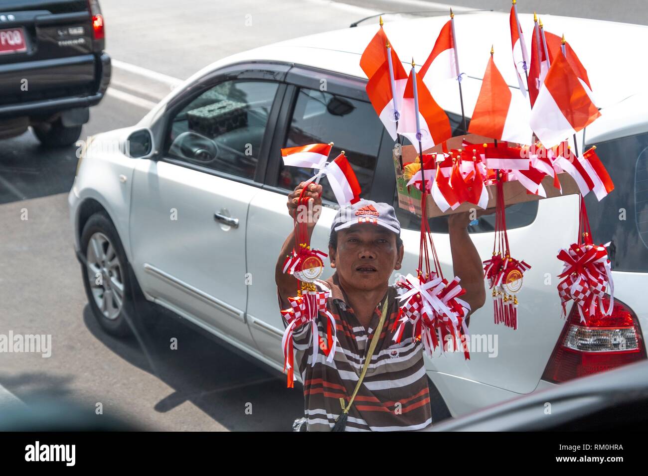 Street vendor selling national flags in Jakarta, Indonesia Stock Photo ...
