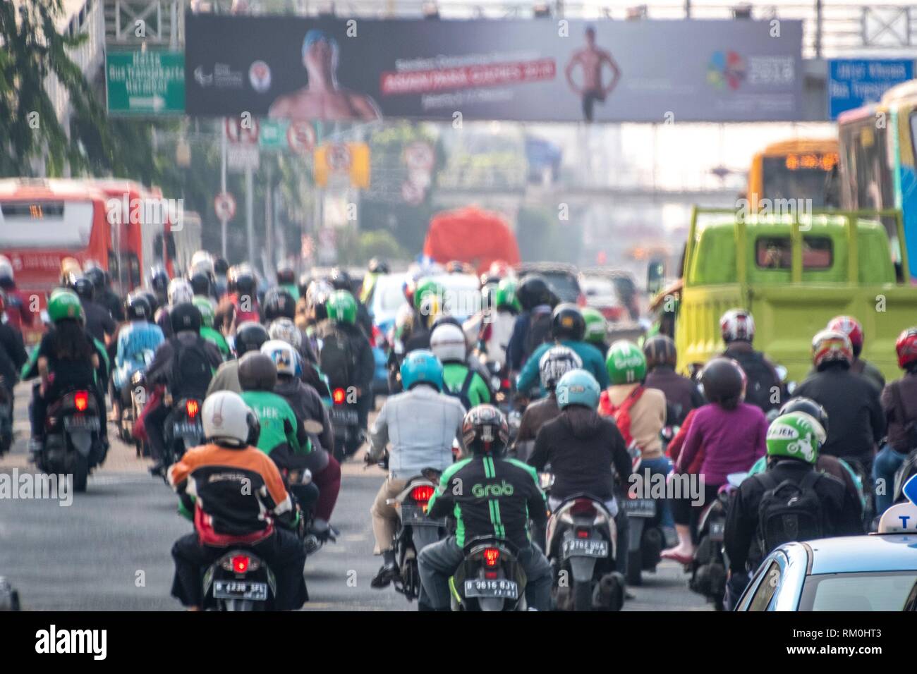 Grab motorcycle taxi hi-res stock photography and images - Alamy