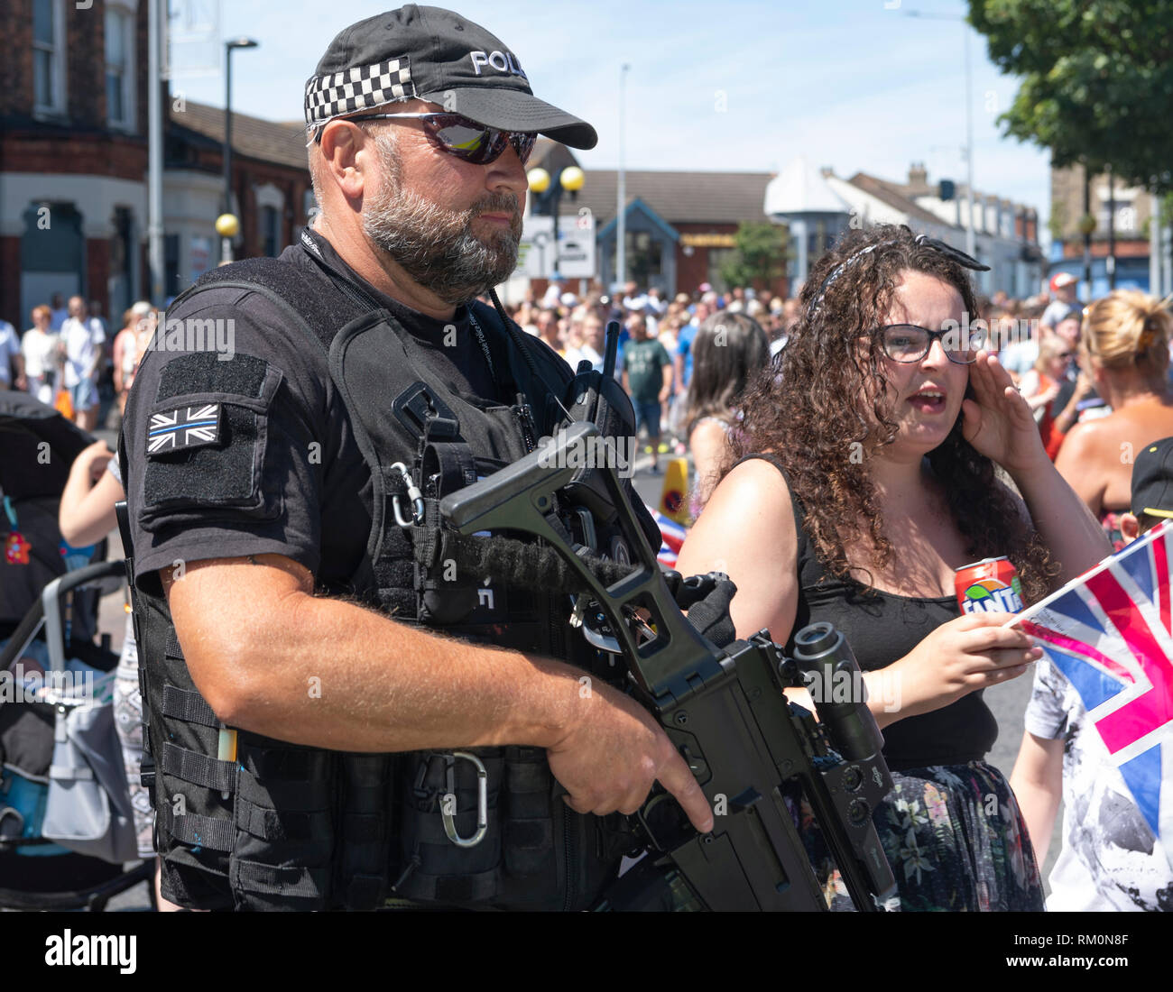 Armed police protect the public from terrorism threat whilst patrolling ...