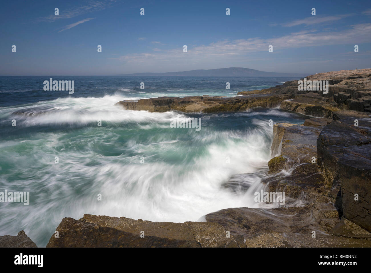 The surf swirls along the rocky coast of Maine in USA Stock Photo - Alamy