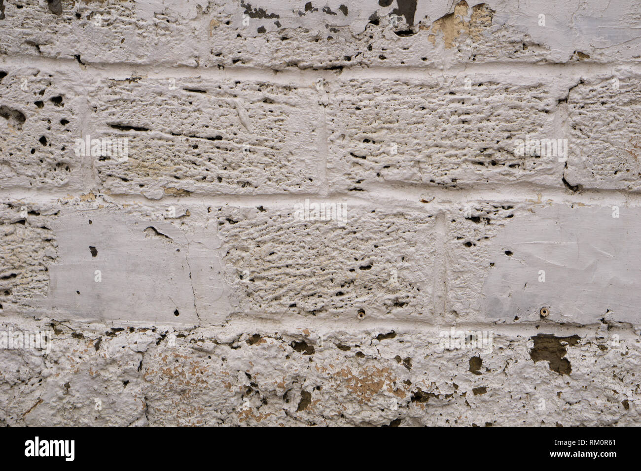 Old white brick stones wall background Stock Photo - Alamy