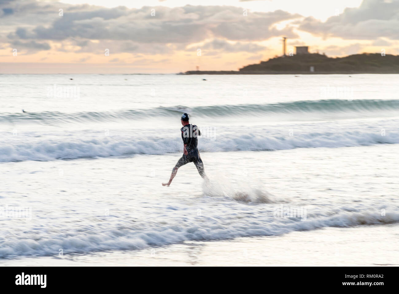 Swim run man hi-res stock photography and images - Alamy