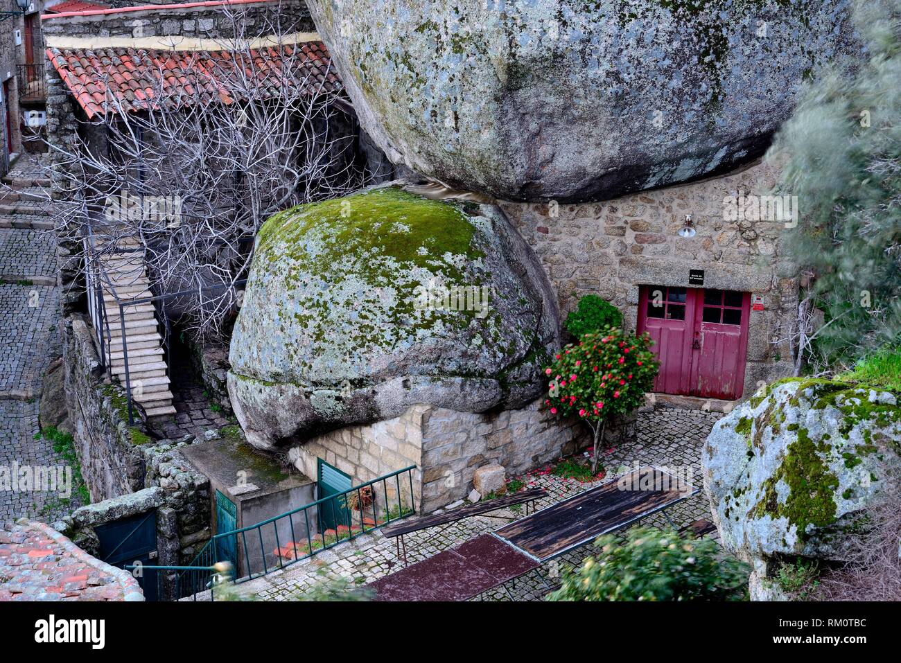 House between rocks portugal hi-res stock photography and images - Alamy