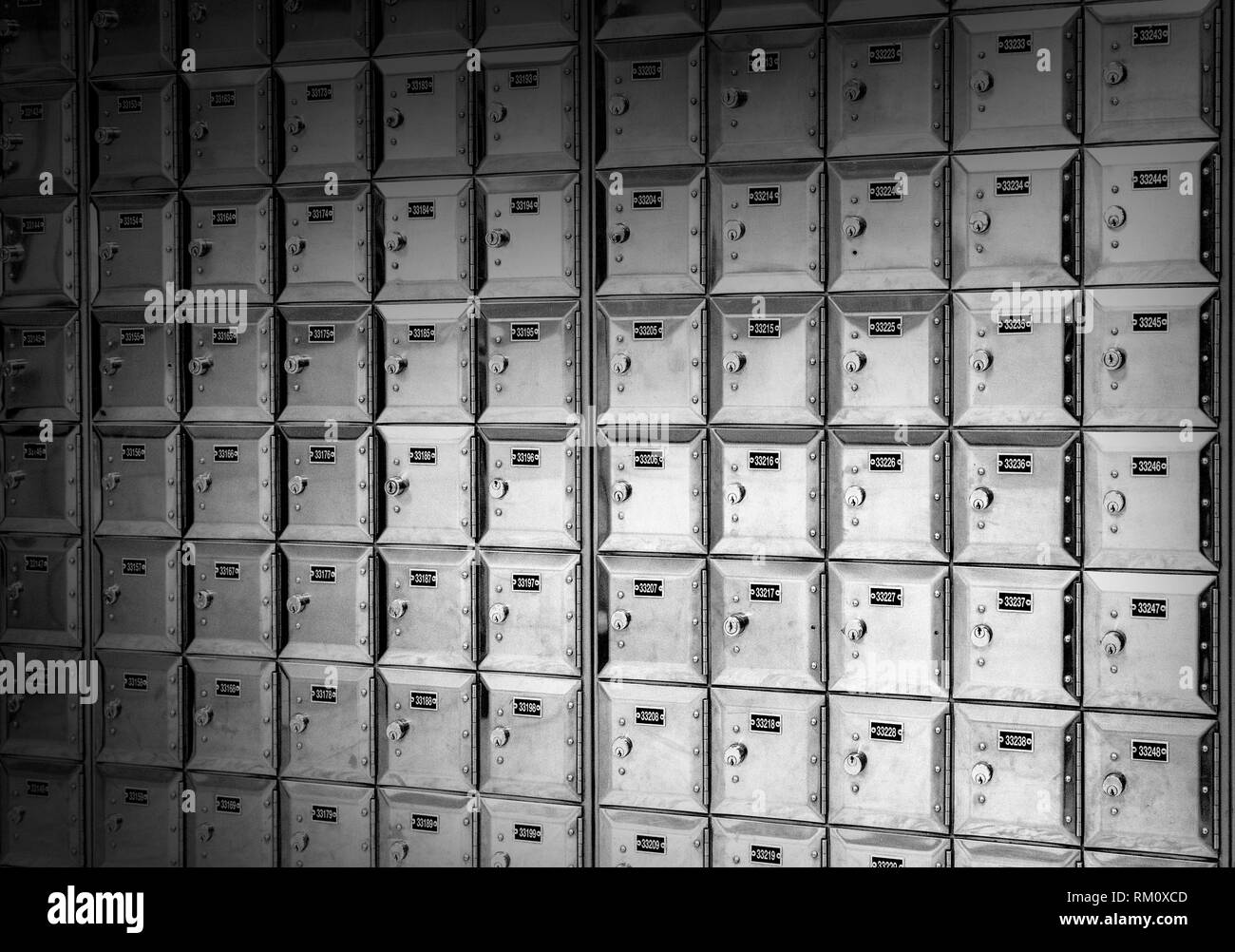 metal mail boxes black and white background Stock Photo - Alamy