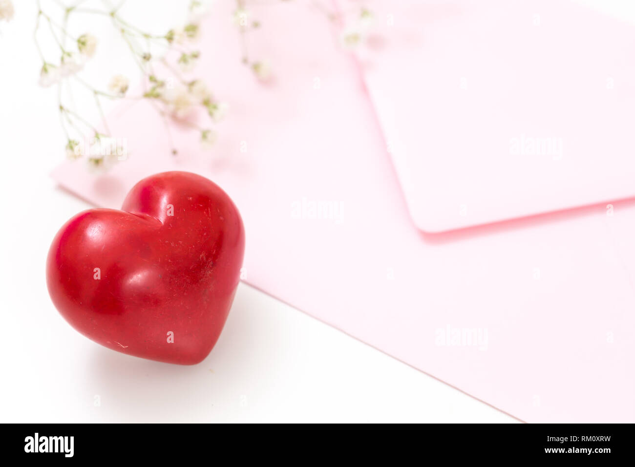 Red heart envelope hi-res stock photography and images - Alamy
