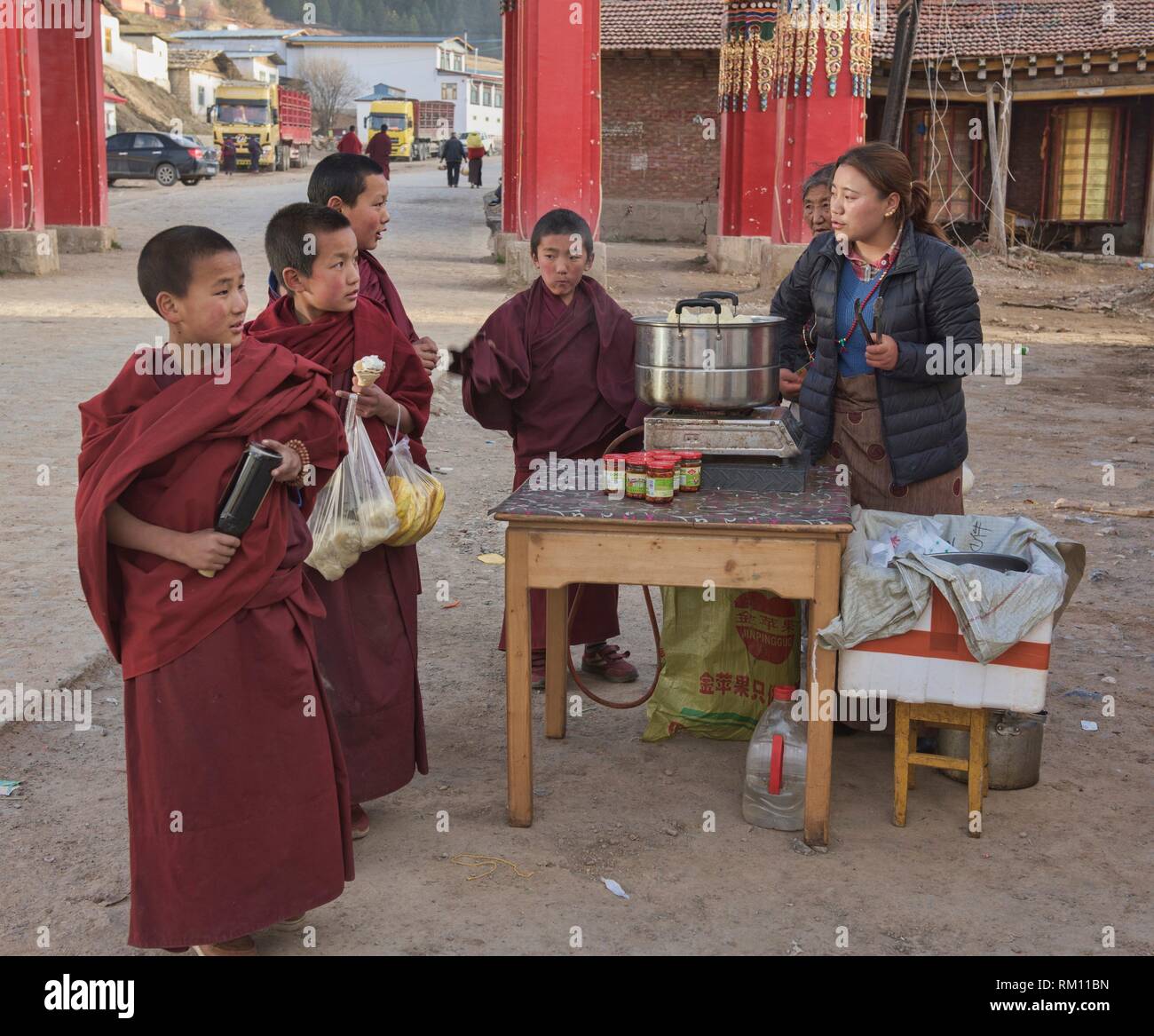 Novice monk eating hi-res stock photography and images - Alamy