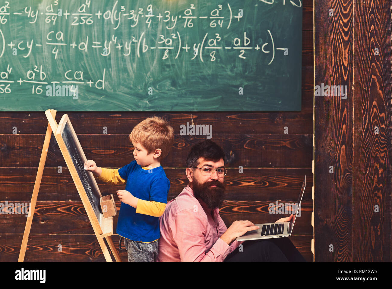 Back view boy student drawing hi-res stock photography and images - Alamy