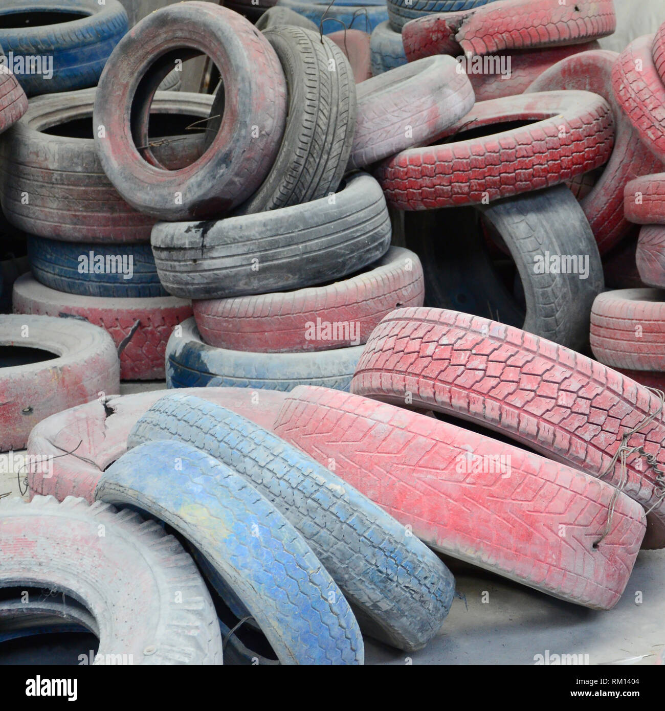 A picture of many old used tires left on a waste dump. The picture of ...
