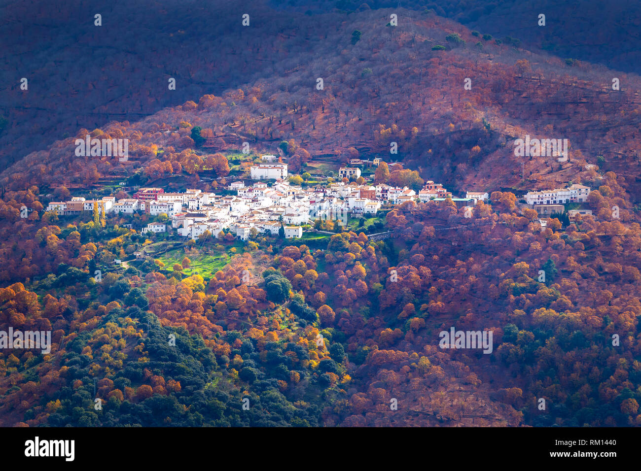 Majestic view of beautiful remote mountains in clouds and sunlight with ...
