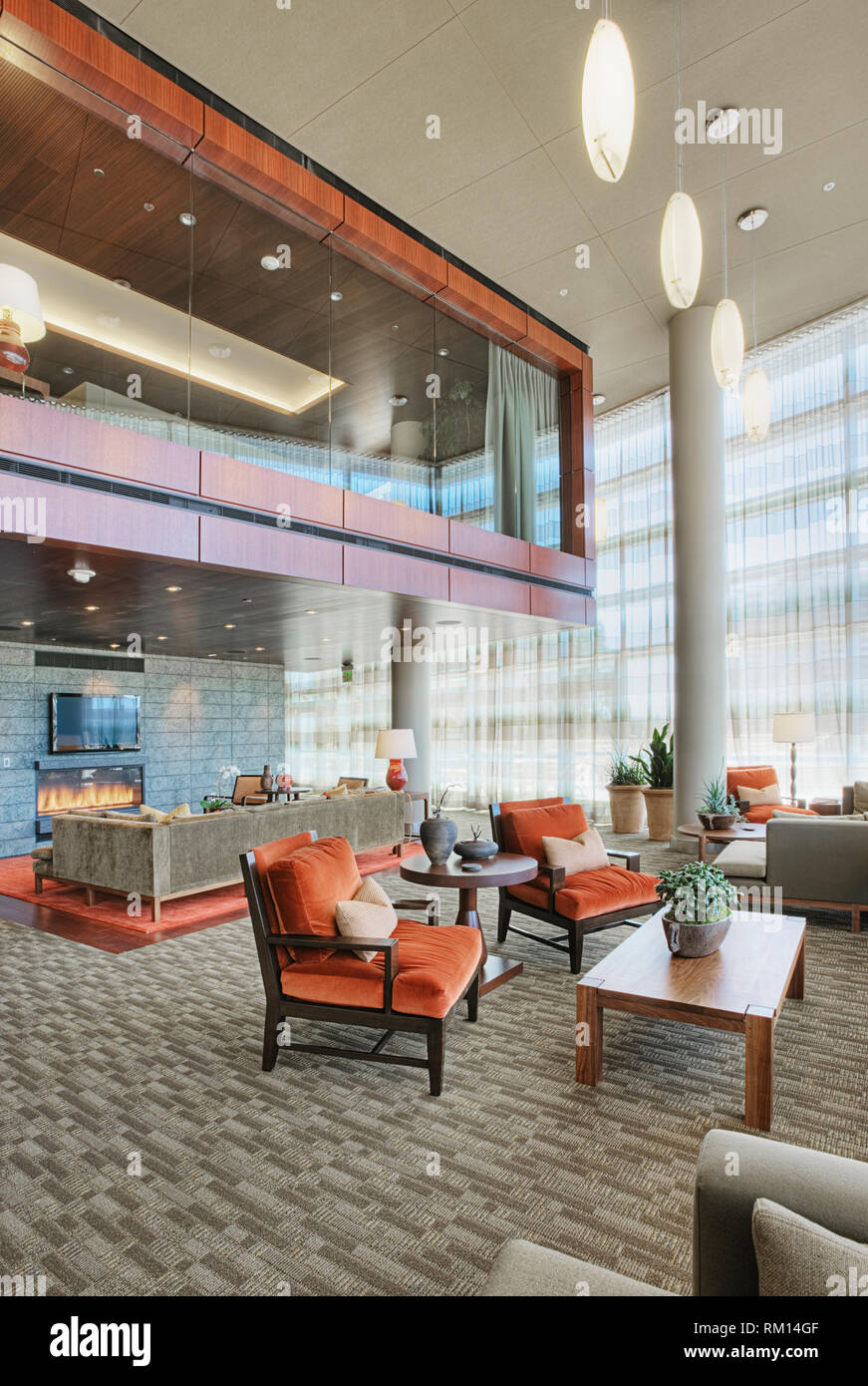 Lobby with fireplace Stock Photo - Alamy