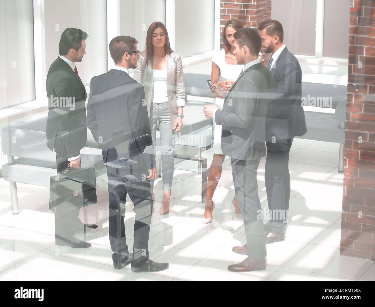 group of business people standing in the Bank hall Stock Photo - Alamy