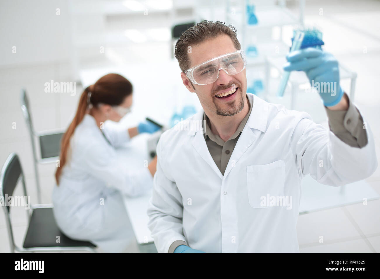 successful scientist checking the results of the examination Stock ...