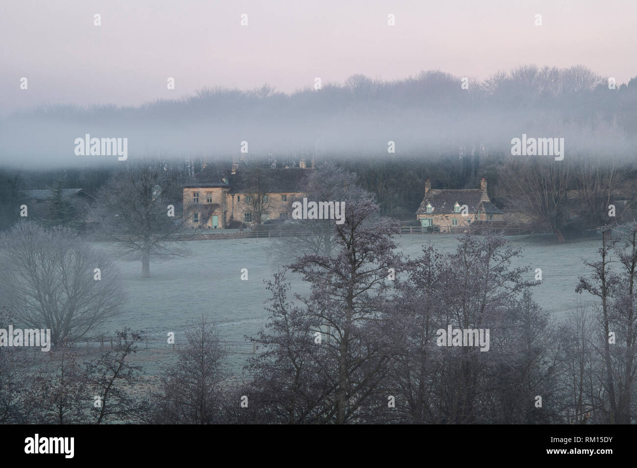 Widford cottages in the misty winter frost just before sunrise. Widford ...