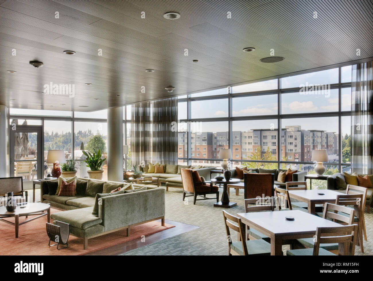 Clubhouse in highrise apartment building Stock Photo - Alamy