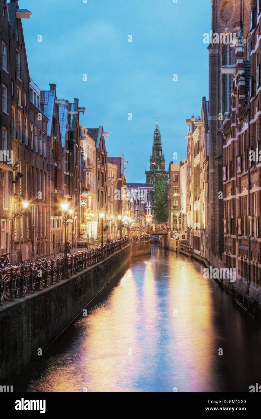 Lit Canal Between Buildings Stock Photo - Alamy