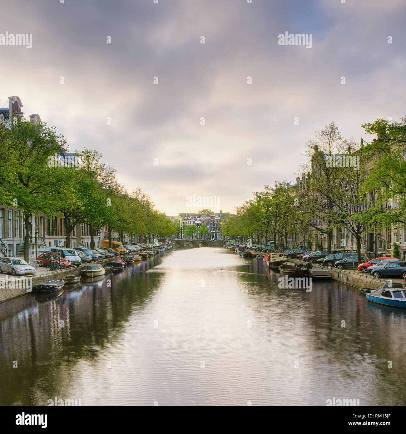 Boats in a Tree Lined Canal Stock Photo - Alamy