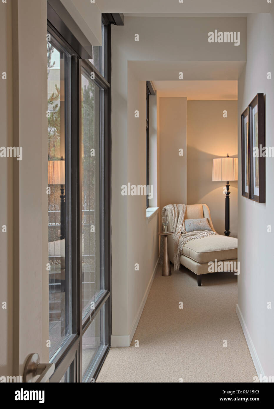 Corridor leading to chaise lounge Stock Photo - Alamy