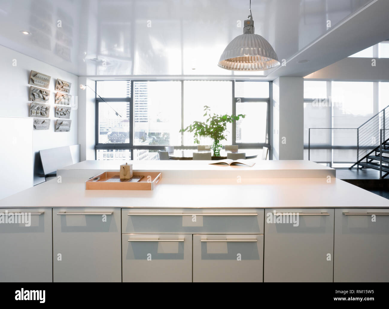Modern kitchen in luxury highrise apartment Stock Photo - Alamy