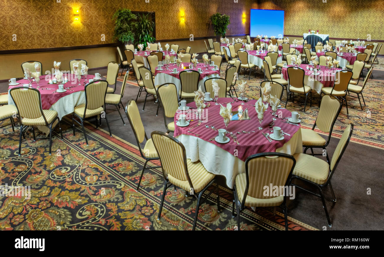 Tables in empty banquet room Stock Photo - Alamy