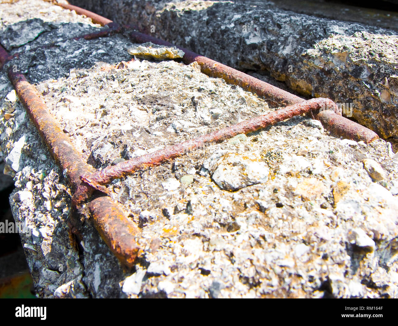 Damaged concrete caused by rusting reinforcement bars Stock Photo - Alamy