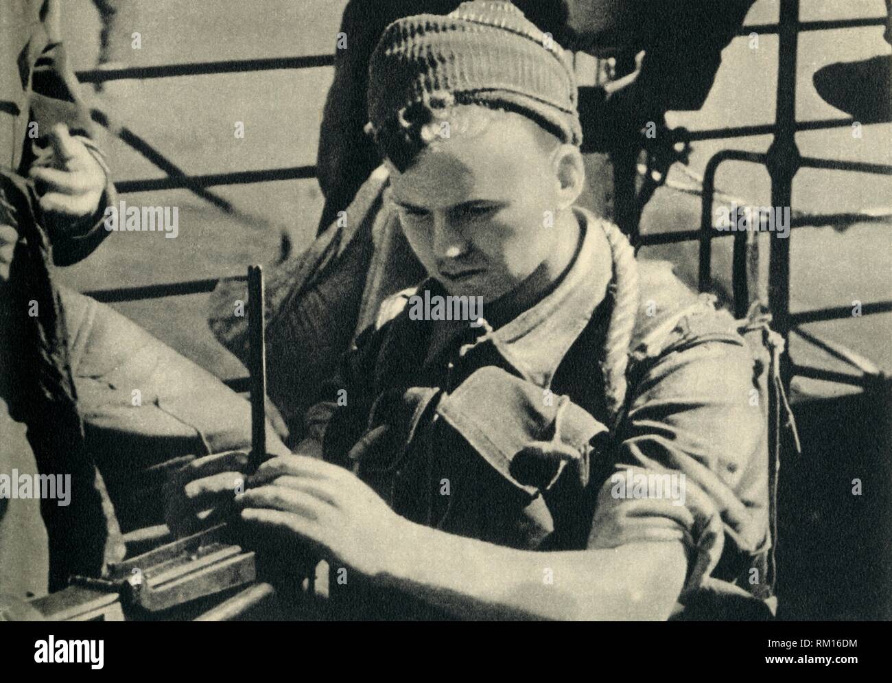 Royal Marine checking his machine gun, World War II, c1939-c1943 (1944 ...