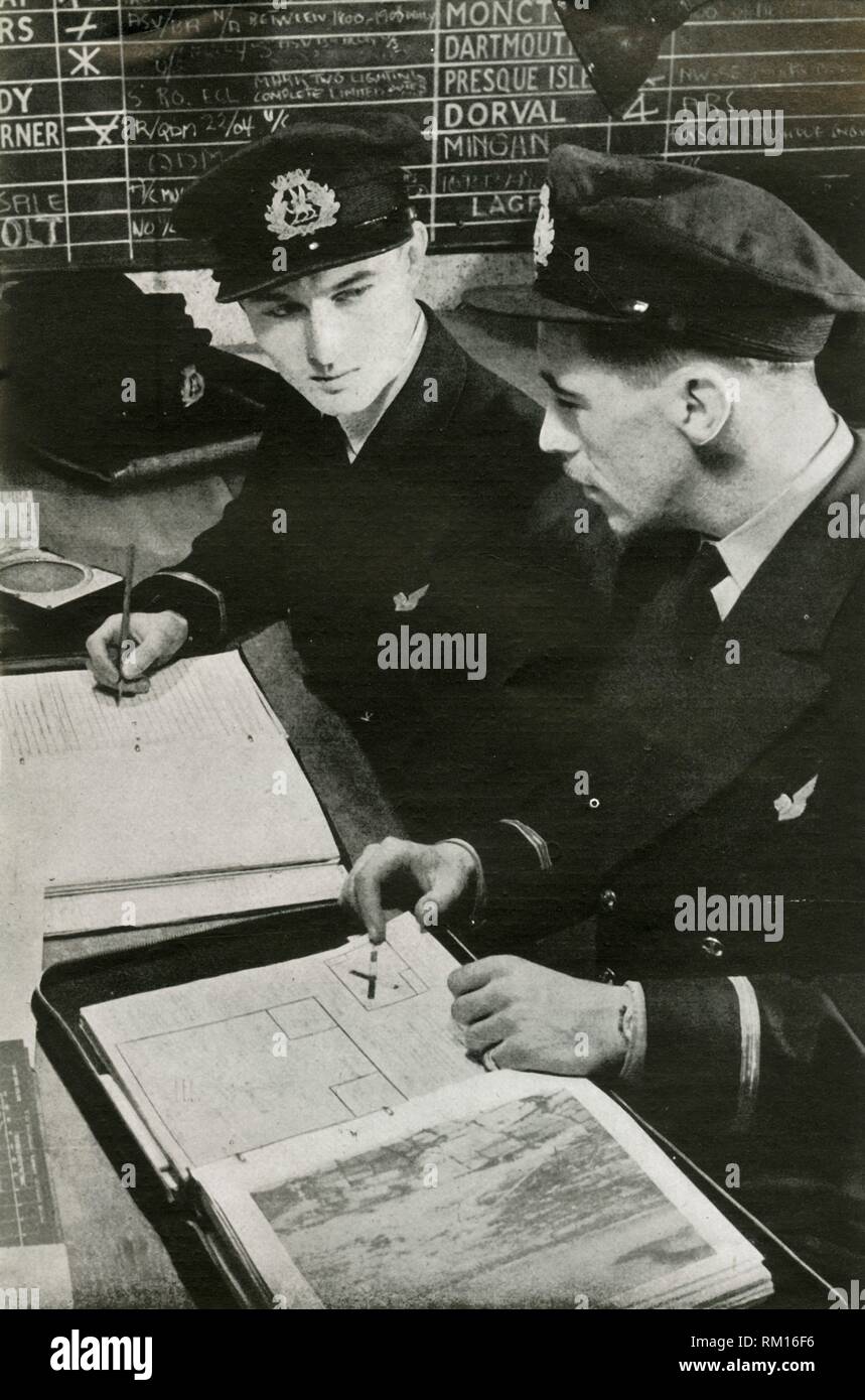 BOAC navigation officers drawing up a flight plan, World War II, c1939 ...