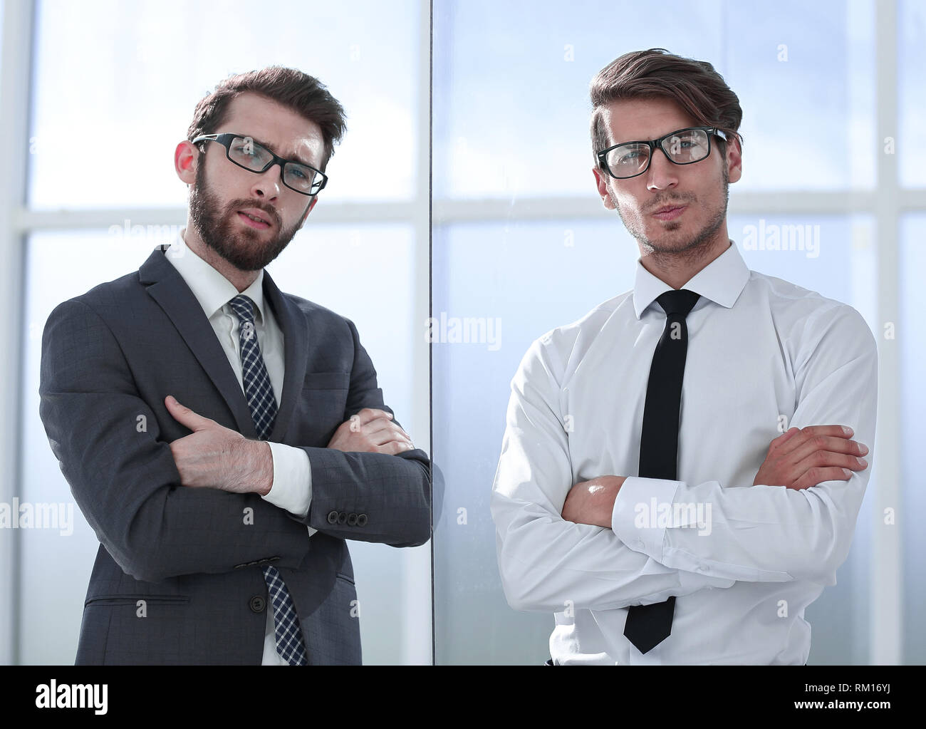 two business people standing in the office Stock Photo - Alamy