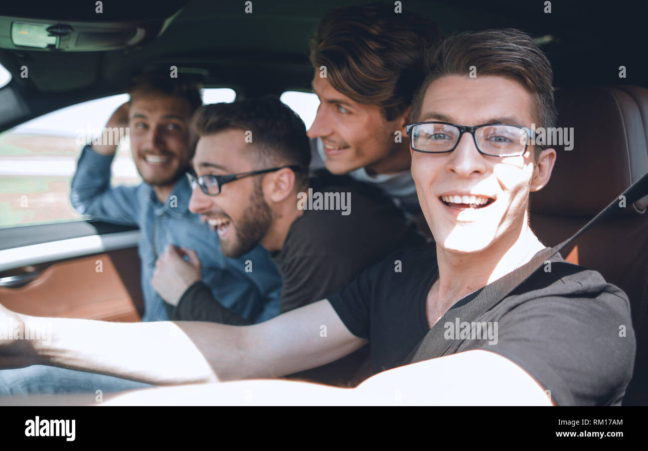 Side View Of Man Driving Open Top Car Stock Photo - Alamy