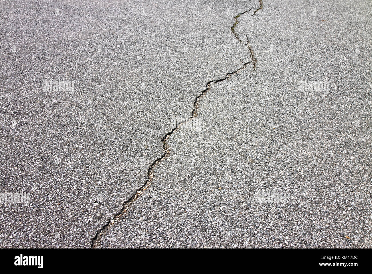Asphalt road damaged after a structural failure - concept image Stock ...