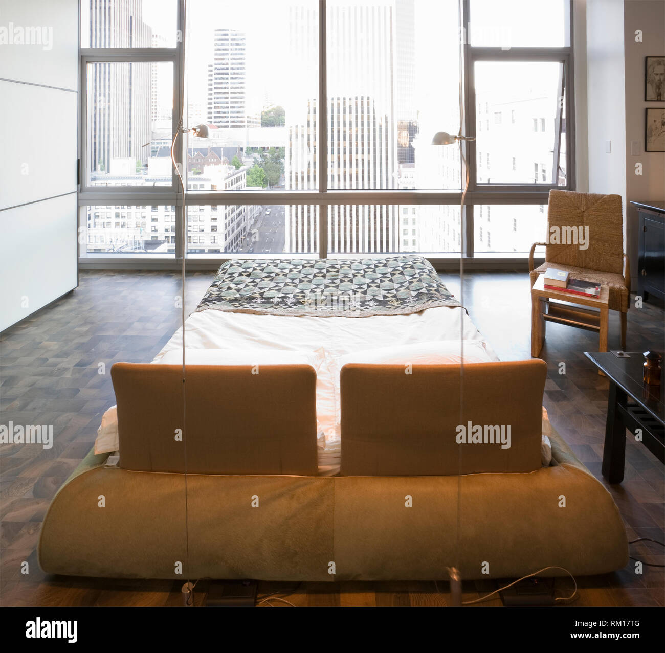 Modern bedroom in luxury highrise apartment Stock Photo - Alamy